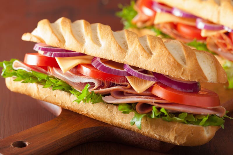 Long Baguette Sandwich with Ham Cheese Tomato Lettuce Stock Photo ...