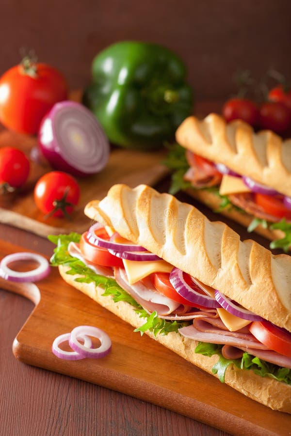 Long Baguette Sandwich with Ham Cheese Tomato Lettuce Stock Photo ...