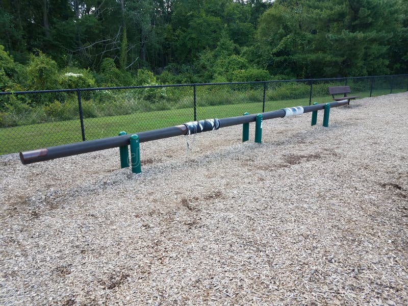 Long Balance Beam at Playground with Brown Wood Chips Stock Image ...