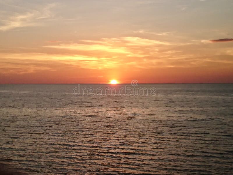 Long beach Sunset stock image. Image of sunset, beach - 110193549