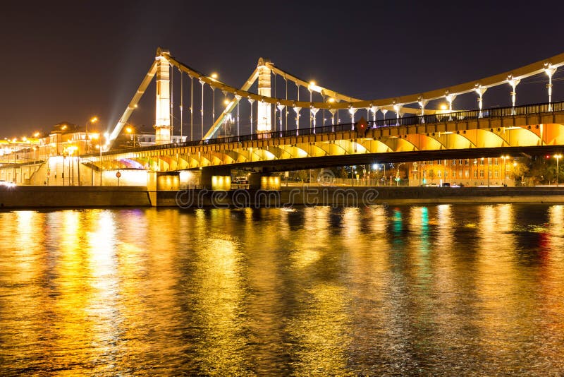 The Long Beautiful Bridge Across the River in the Evening. Stock Image ...