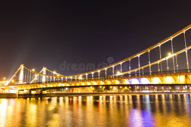 The Long Beautiful Bridge Across the River in the Evening. Stock Image ...