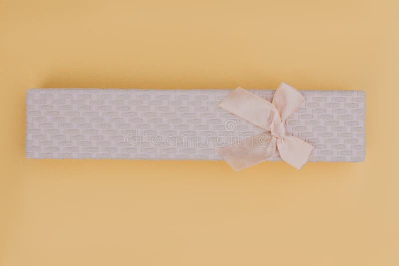 Long beige gift box. stock photo. Image of background - 134033294