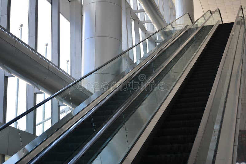 Long Black Escalator Steps Going Up and Down Stock Image - Image of ...