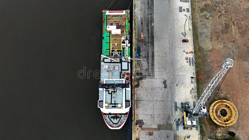 A Long Boat Docked in a Harbor with Its Load of Water Stock Image ...