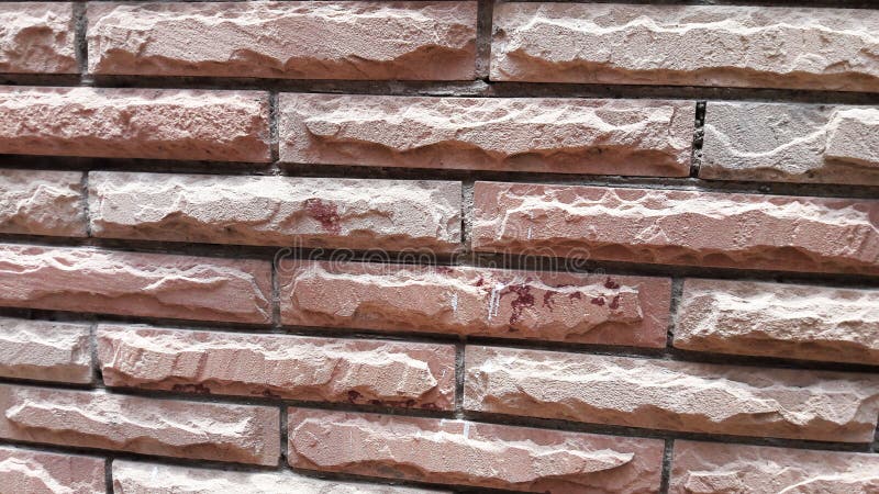 Long Row of Bricks Outside of a Building Stock Photo - Image of roof ...