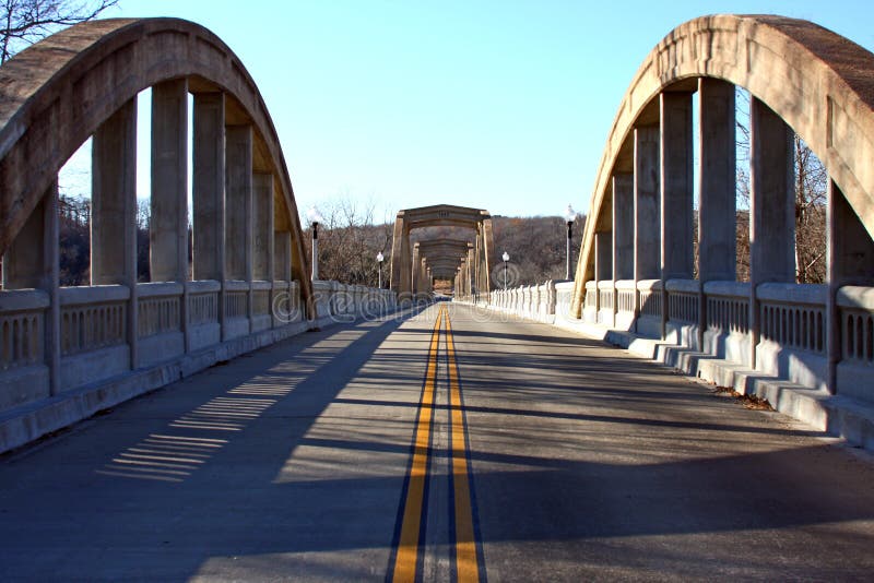 Long Bridge with Concrete Columns Surrounded by Leafless Trees Stock ...