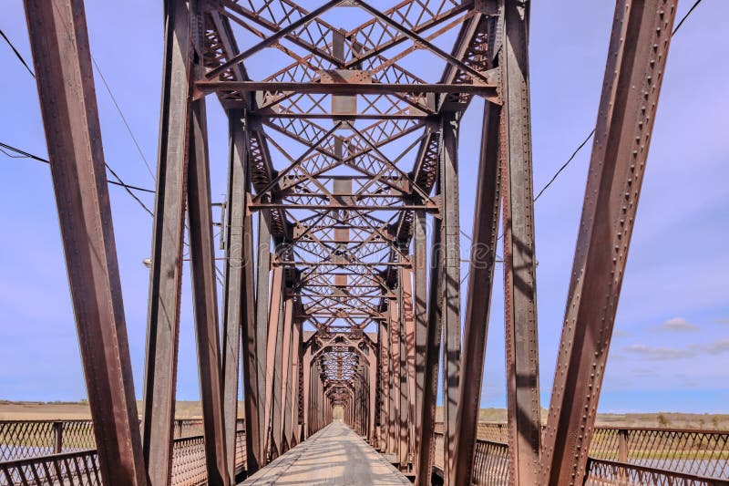 A Long Bridge with a Lot of Metal and Wires Stock Image - Image of ...