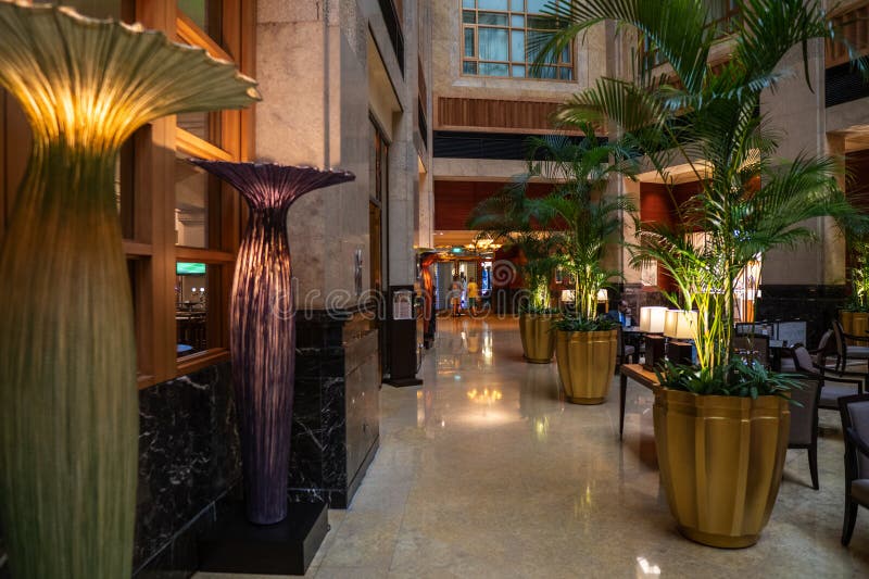 Long Bright Corridor in a Luxury Hotel Stock Image - Image of black ...