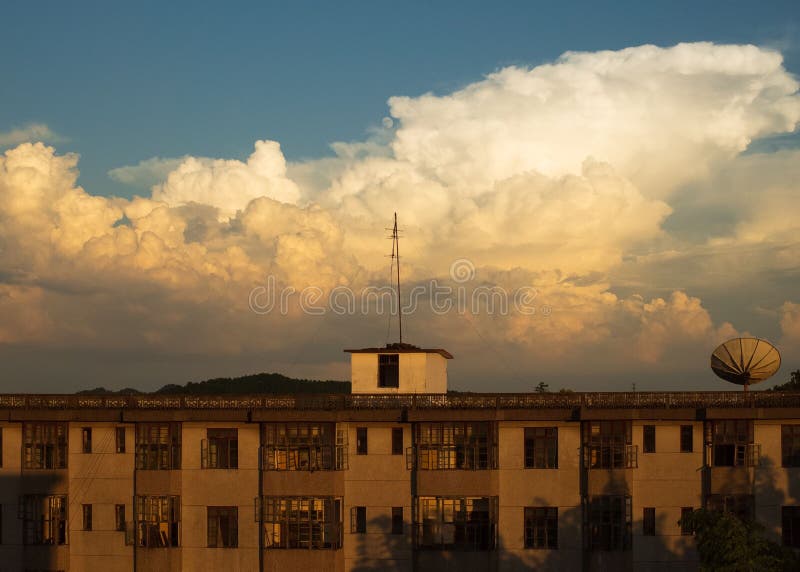 Long Building with Clouded Sky in the Background at Sunset Stock Image ...