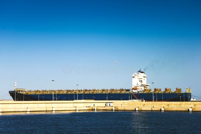 Long Cargo Ship Docked on the Seafront in the Dock Port Stock Image ...