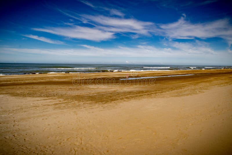 Sunset at the Beach of Carilo Stock Photo - Image of clouds, water ...