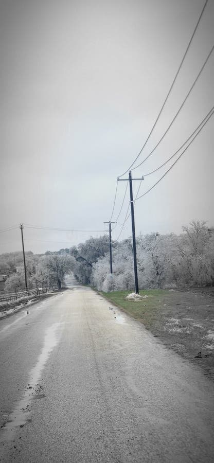 The long cold frozen road stock image. Image of storm - 269813563