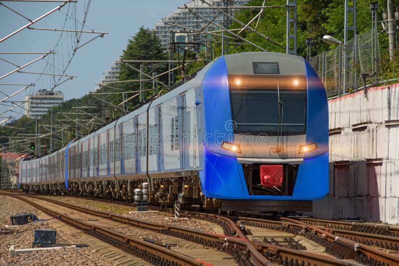 Long Composition of a Blue Suburban Electric Train on the Hauls of the ...