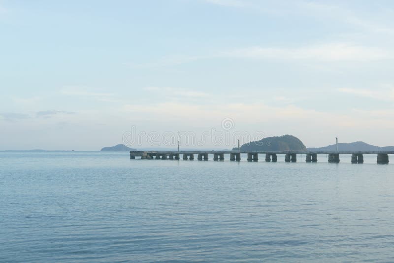 Long Concrete Jetty with Islands and Sky Background Stock Photo - Image ...