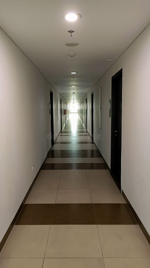 Long Corridor of an Apartment Building Stock Photo - Image of house ...
