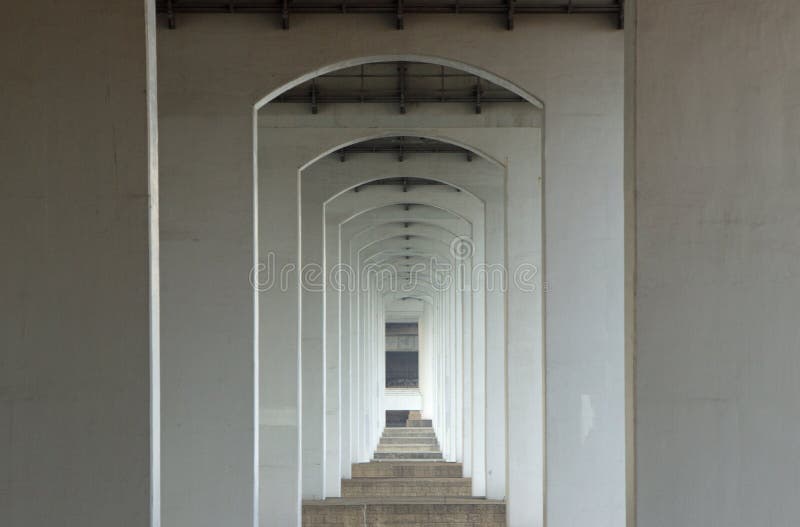 Long Corridor with Arch-shaped White Walls in an Old Building Stock ...