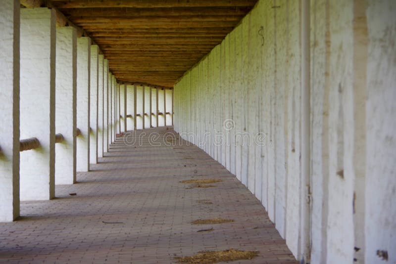 A Long Corridor with Columns in an Old Monastery in the Astrakhan ...
