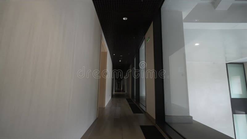 Long Corridor with Curved Windows. Dolly Camera Shot Stock Footage ...
