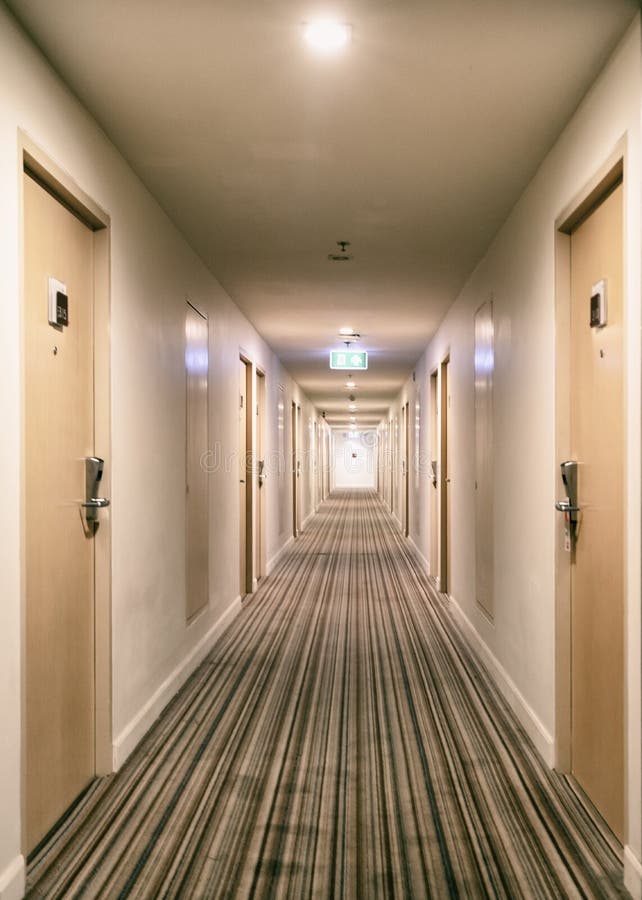 Long corridor with door stock image. Image of room, building - 119346215