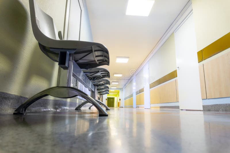 Long Corridor in Hospital with Chairs Stock Photo - Image of effort ...