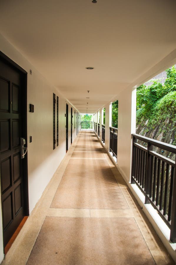 Long corridor in hotel stock photo. Image of motel, carpet - 64504138