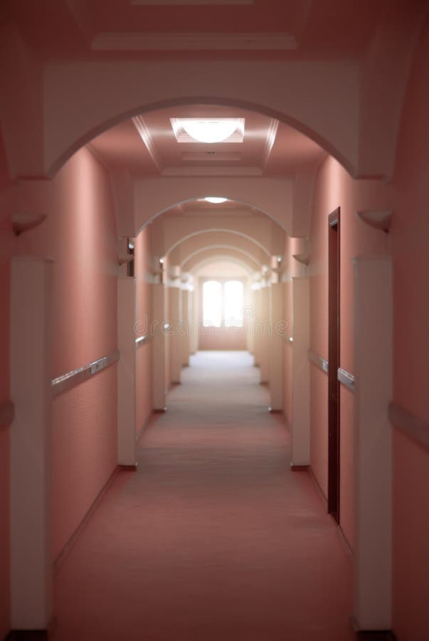 The Long Corridor in the Hotel is Red Stock Image - Image of entrance ...