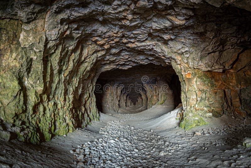 A Long Corridor Inside the Cave Stock Image - Image of mountains, dark ...