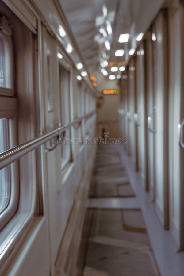 A Long Corridor Inside a Passenger Rail Car. Geometric Lines, Blurred ...