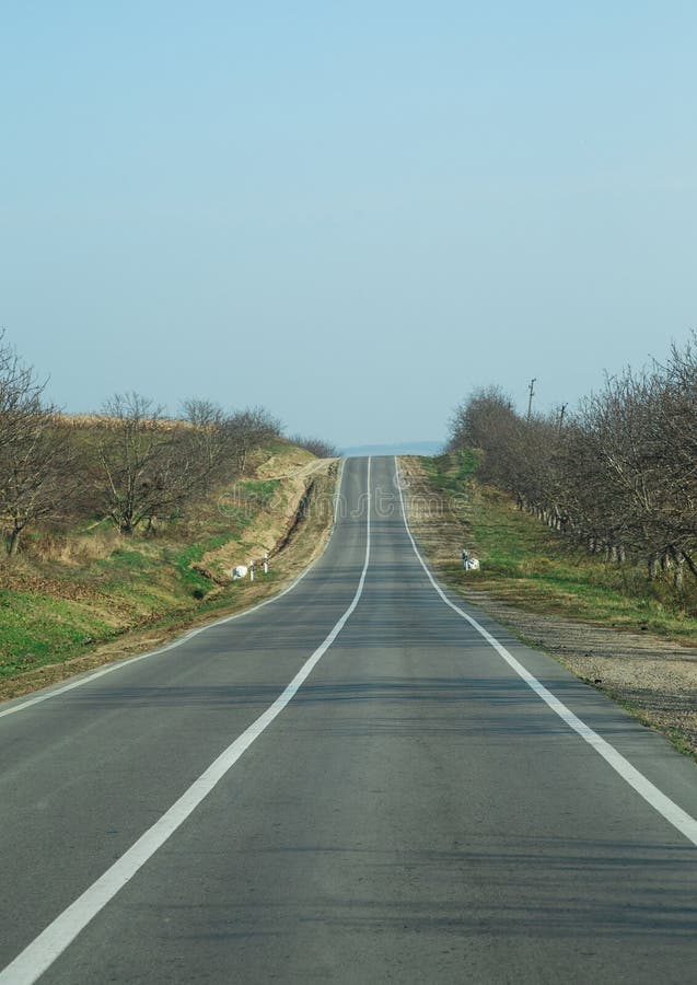 A long country road stock photo. Image of long, clouds - 51089950