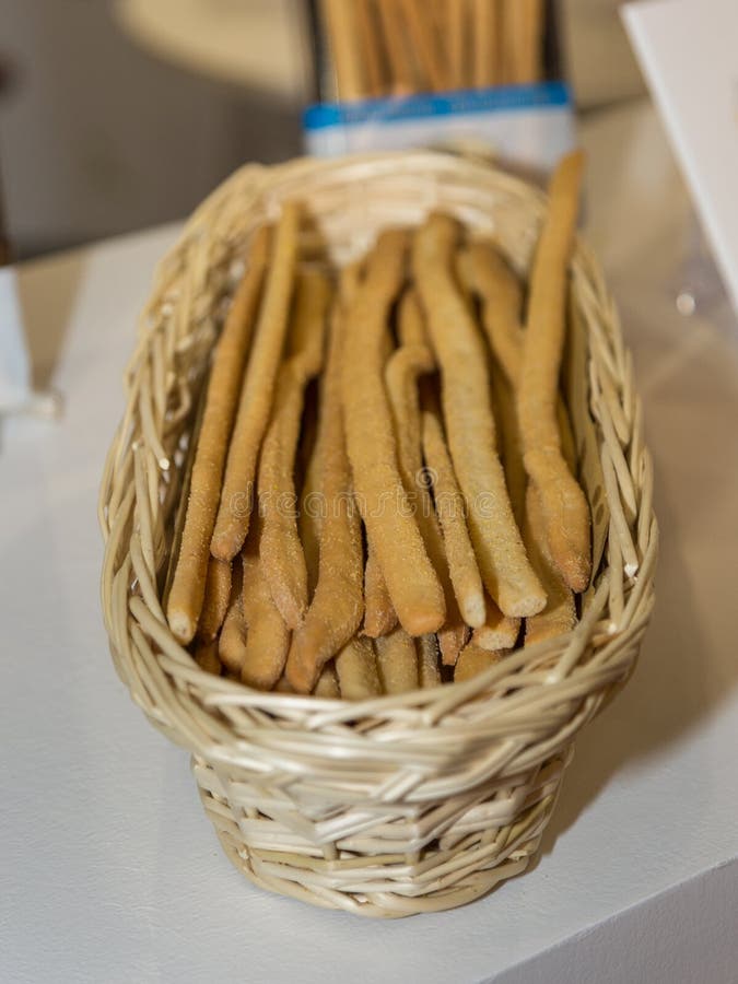 Long Crispy Breadsticks Inside a Wicker Basket Stock Image - Image of ...