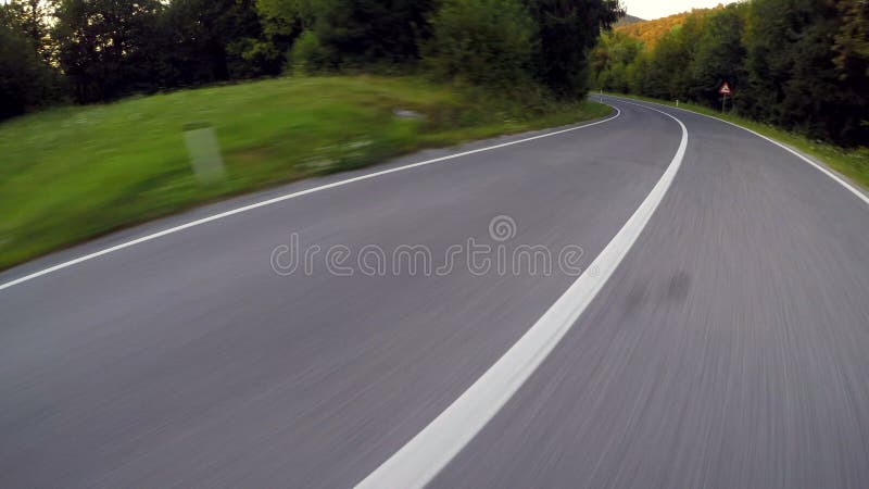 Long and Curve Road with Trees and Grass on the Side Stock Video ...