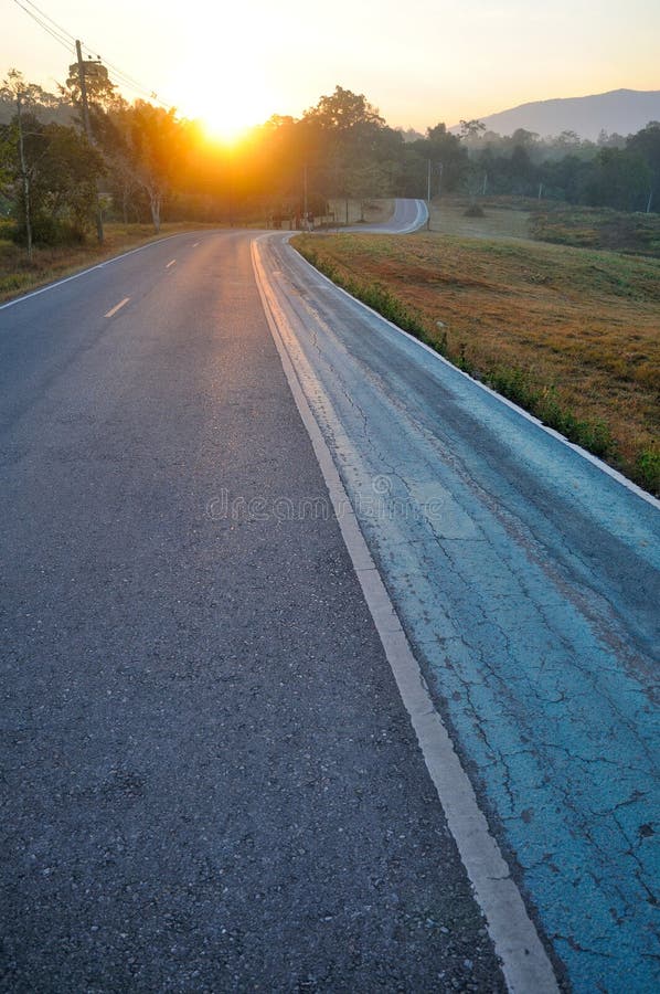 A Long Curvy Road in the Mountain Stock Photo - Image of ride, pavement ...