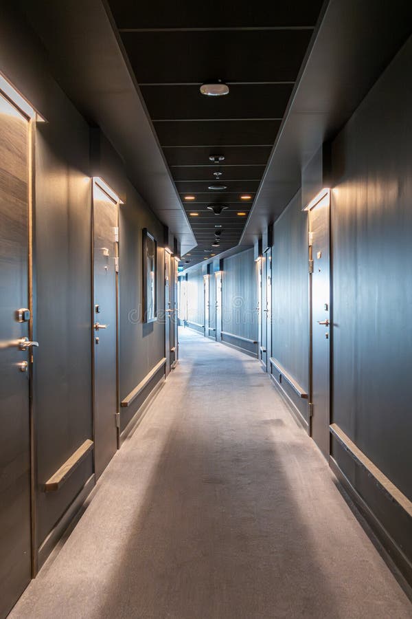 Image of Long Dark Corridor in a Luxury Hotel Stock Photo - Image of ...