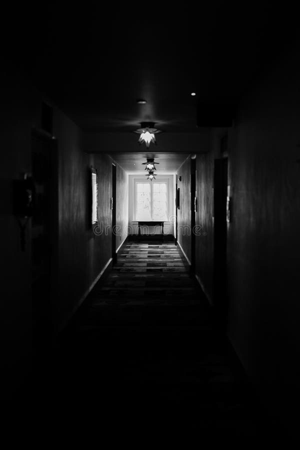 Long dark hallway to light stock image. Image of dark - 128783989