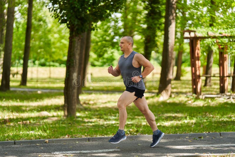 Long Distance Runner Training in the Park Stock Image - Image of male ...