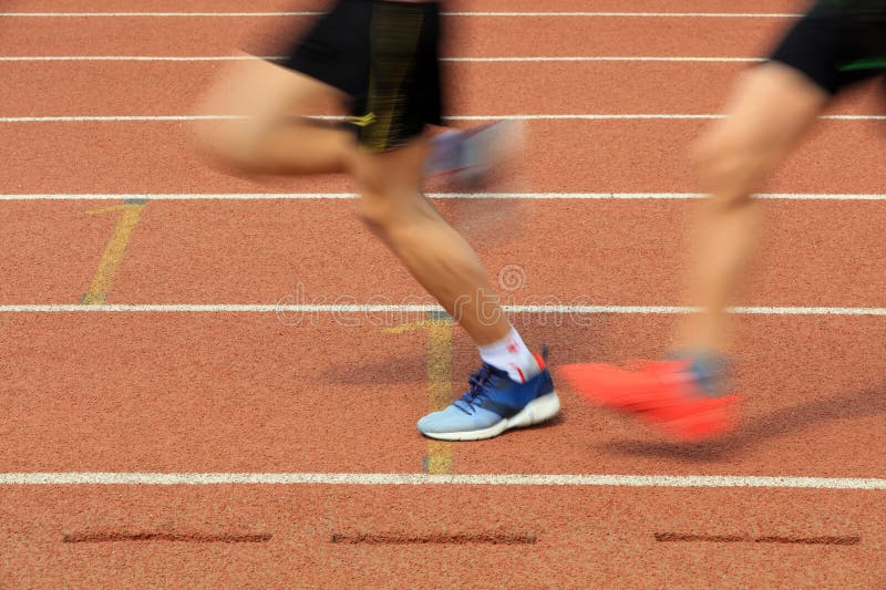 Long Distance Runners are Running on the Track Stock Image - Image of ...