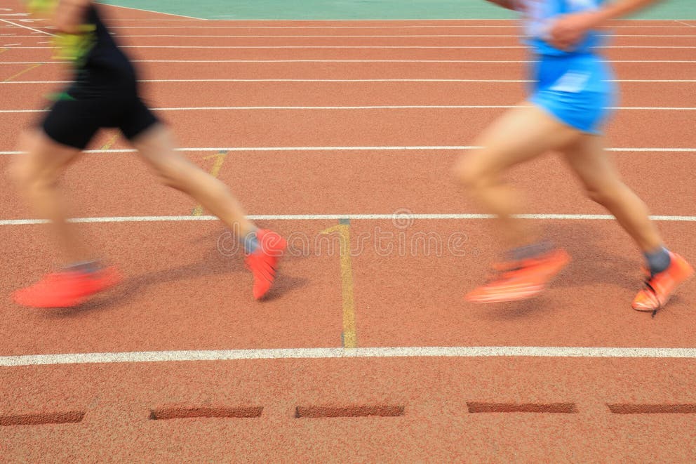 Long Distance Runners are Running on the Track Stock Image - Image of ...