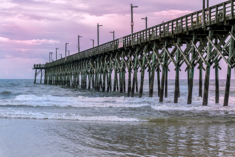 Long Dock at the Beach at Sunset Stock Photo - Image of wooden, sunrise ...