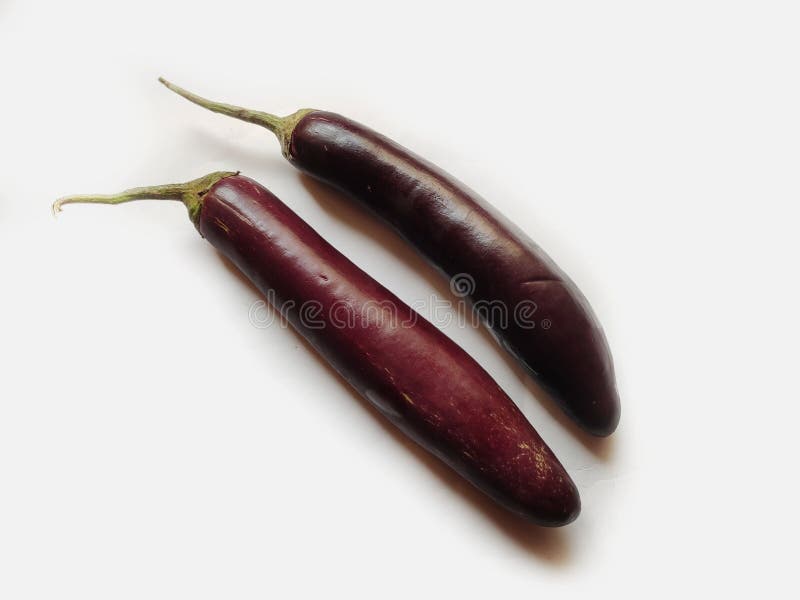 Long eggplants in a basket stock photo. Image of nutrition - 288901404