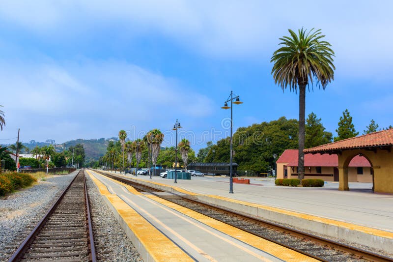 A Long, Empty Train Track at Santa Barbara Station, Surrounded by Palm ...