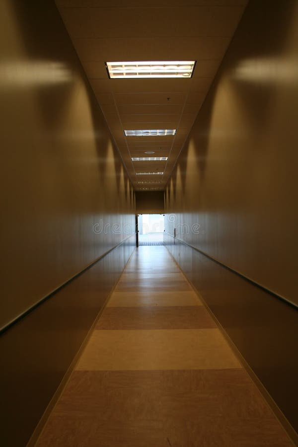 Long Hallway Leading To Exit Stock Image - Image of scene, space: 32410671