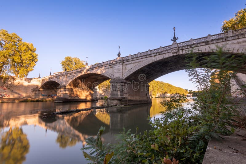 Long Exposition Shot of a Bridge on the Tevere River in the Center of ...
