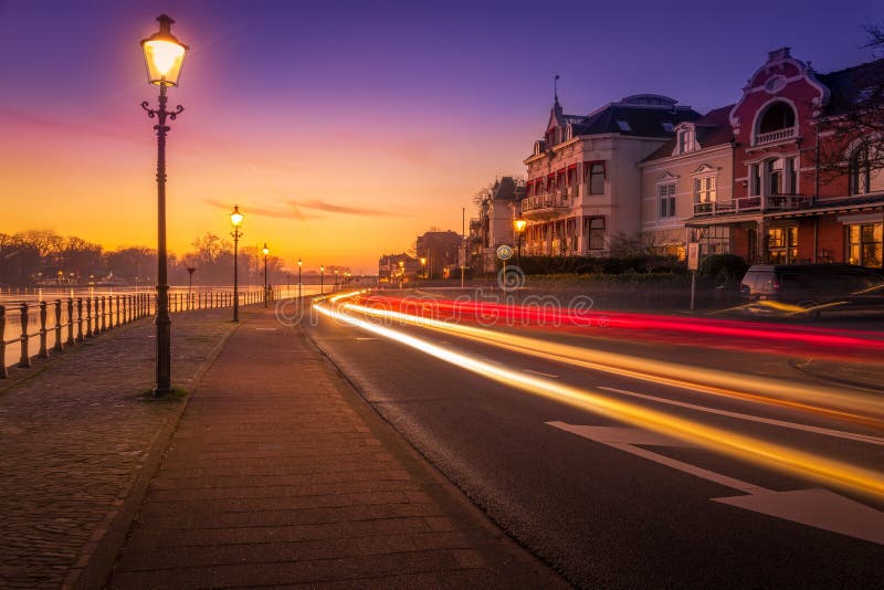 Long Exposure of a Busy Street Alongside a Coast during Sunset Stock ...