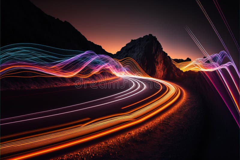 A Long Exposure of a Car Light Trail on a Road at Night Time with Mountains in the Background ...