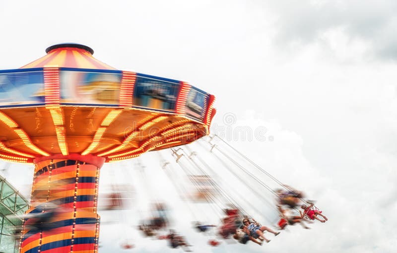 A Chairoplane spinning editorial stock photo. Image of pier - 99555298