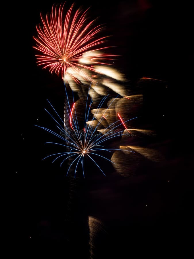 Firework Bursts in Night Sky, Long Exposure Stock Photo - Image of ...