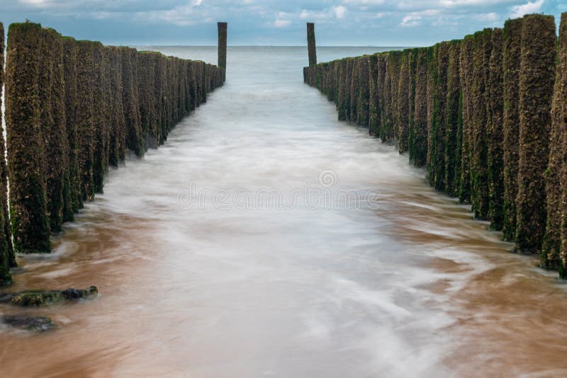 Long Exposure of the Dutch Coastline with the Water Breakers during Low ...