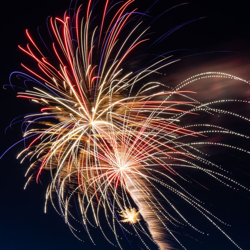 Long Exposure of Fireworks in the Dark Sky Stock Image - Image of ...
