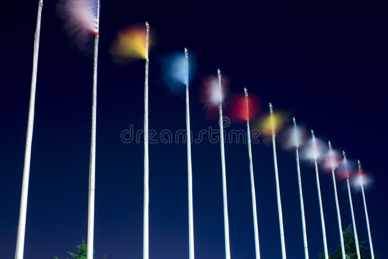 Long Exposure Flags. Waving Flags on the Wind at Night Stock Image ...